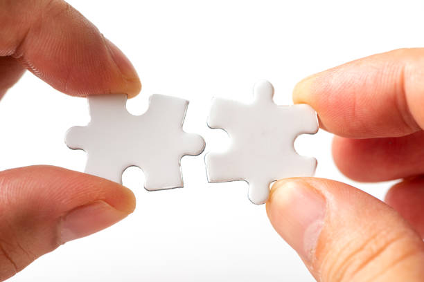 Free Stock Photo of Two white puzzle pieces fitting together | Download ...