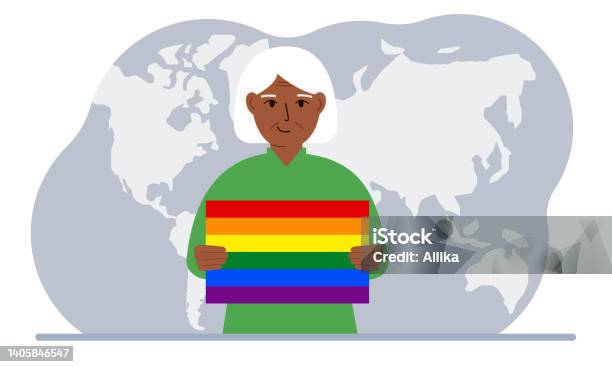 Seorang Wanita Tua Memegang Bendera Lgbt Di Tangannya Dengan Latar