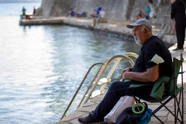 Free picture: Fisherman sitting on concreate stair and fishing with ...
