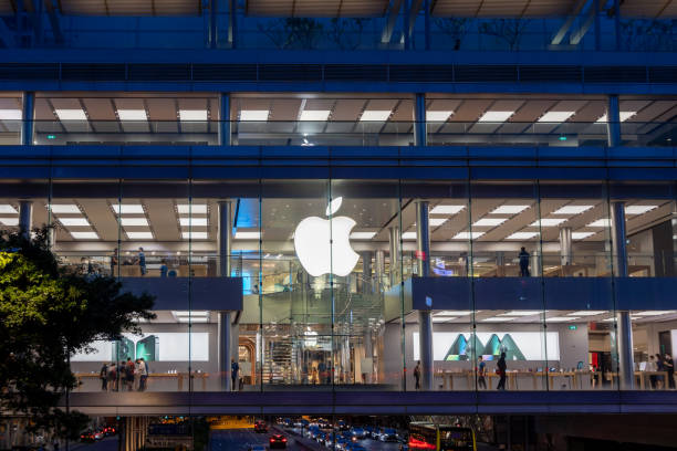 Free Stock Photo of Apple Logo Illuminated on Building Facade at Night ...