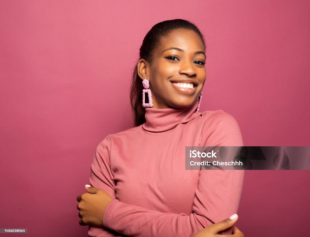 Portrait Of Young Beautiful Smiling Dark Skinned Woman Isolated Over