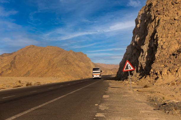 Free Stock Photo of Bus Driving Down Desert Road | Download Free Images ...