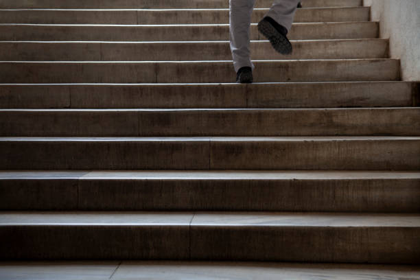 Man Walking Down Stairs