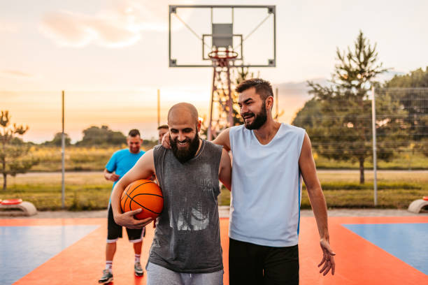 Free Stock Photo of Group of Men Playing a Game of Basketball ...