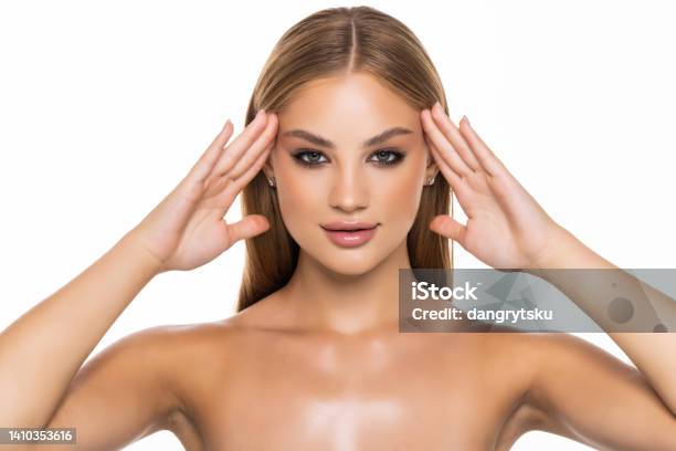 Young Pretty Woman Touching Her Face Isolated On White Background 照片檔及更