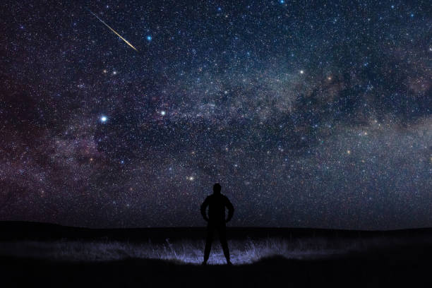 Free Stock Photo of Man Standing in Field Under Starry Night Sky ...
