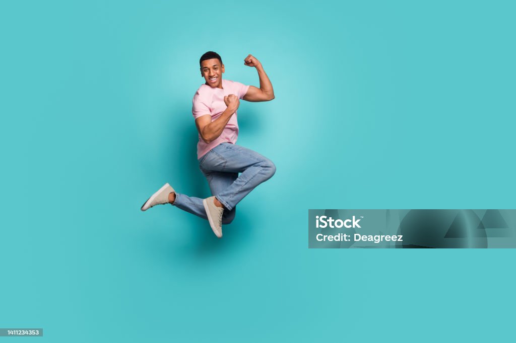 Full Length Photo Of Cool Strong Man Dressed Pink Tshirt Rising Fists