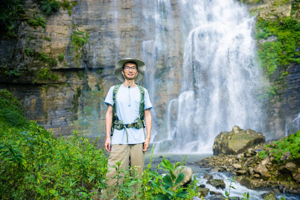 Free Stock Photo of Man Standing near waterfall | Download Free Images ...