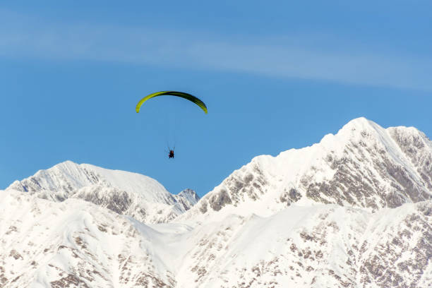 Free Stock Photo of Paraglider Flying Over Mountain Range | Download ...