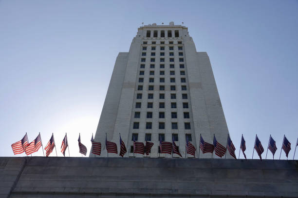 Free Stock Photo of Two Tall Buildings With Flag in the Middle ...