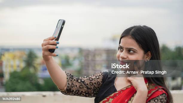 Beautiful Indian Girl Taking Selfie On Her Mobile Phone Outdoor