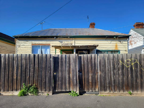 Free Stock Photo of Weathered wooden fence by a traditional house ...