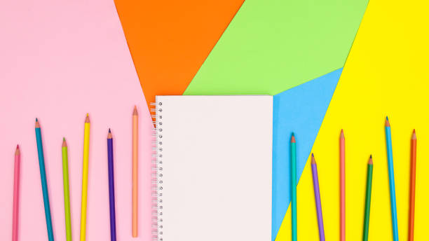 Free Stock Photo of Bright minimalist workspace with colorful notebooks ...