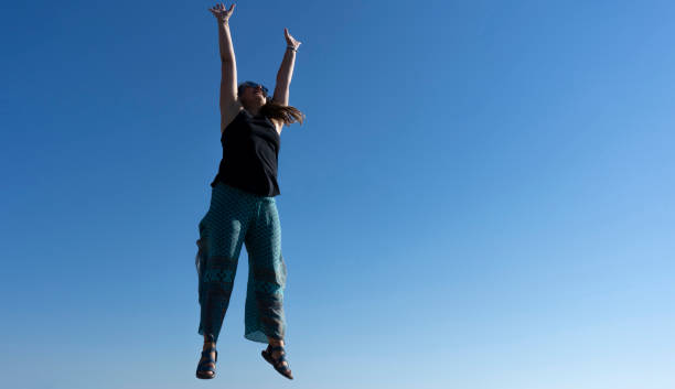 Free Stock Photo of Person Jumping in the Air With Feet Raised ...