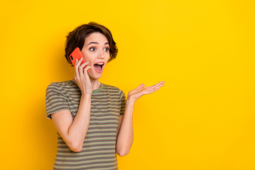 Photo Of Cute Impressed Girl Dressed Green Tshirt Communicating Modern
