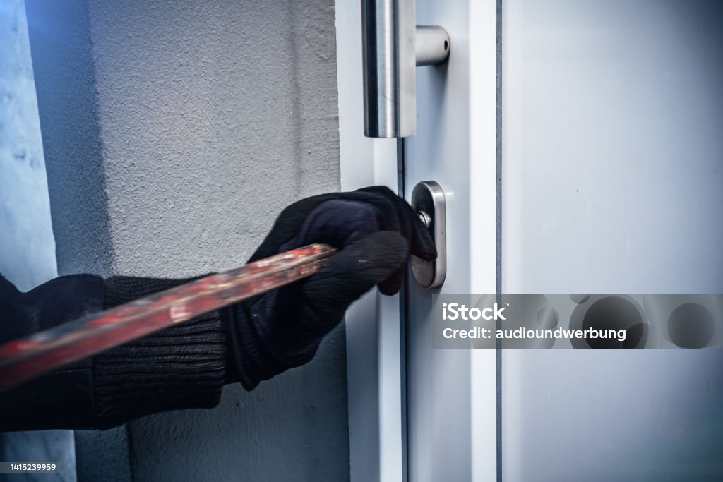 Masked Burglars Breaking And Entering Into A Victims Home Stock Photo ... Masked Burglars Breaking And Entering Into A Victims Home Stock Photo ...