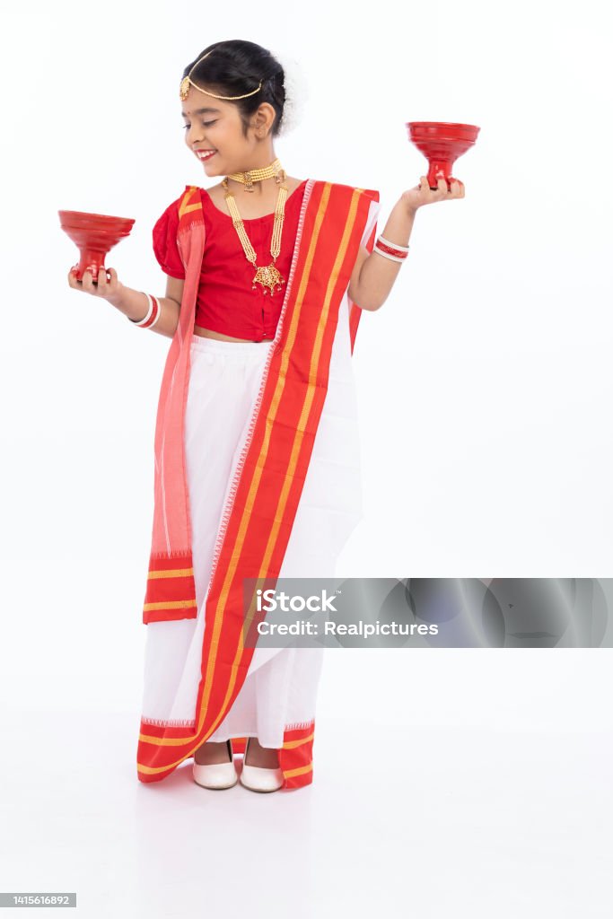 Happy Bengali Girl In Traditional Clothing Holding Clay Pots On
