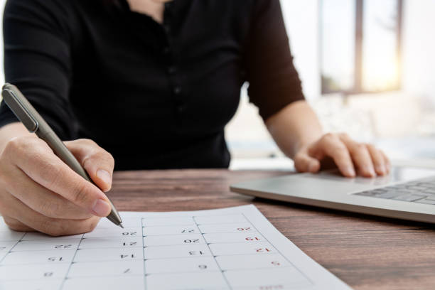 Free Stock Photo of A woman writing on a calendar | Download Free ...