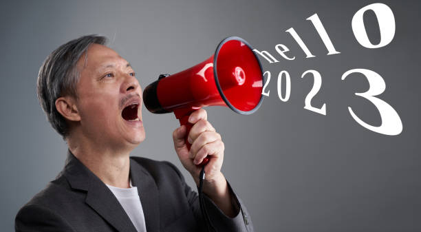 Free Stock Photo of Man in Suit Holding Megaphone | Download Free ...