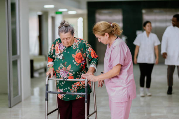 Free Stock Photo of Doctors help elderly patients with mobility and ...
