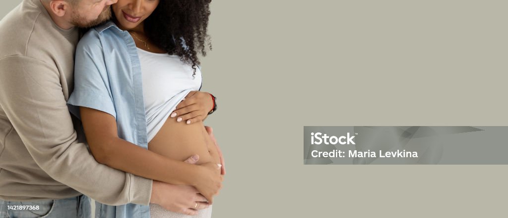 White Man Touching Belly Of His Pregnant Black Wife Pregnant Woman And