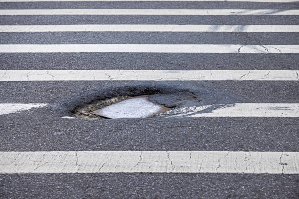 Pothole Pictures | Download Free Images on Unsplash