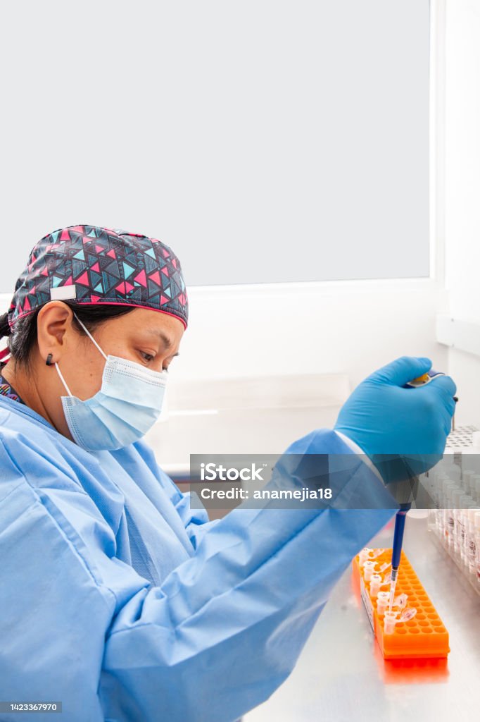Female Scientist Extracting Dna Using The Spin Columnbased Nucleic Acid ... Female Scientist Extracting Dna Using The Spin Columnbased Nucleic Acid ...