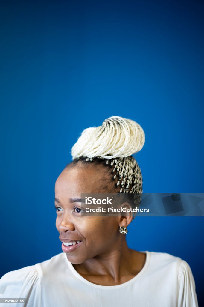 Portrait African Woman Looking Away With Blond Braided Hair Posing With