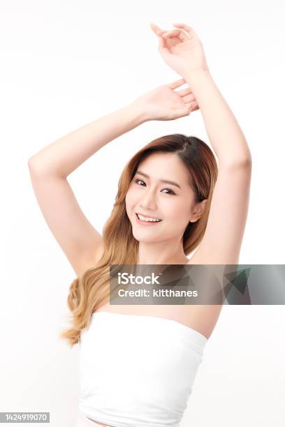 Beautiful Young Asian Woman Lifting Hands Up To Show Off Clean And