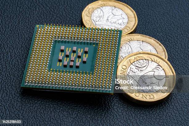 Large Computer Chip Cpu And British Pound Coins Stock Photo - Download ... Large Computer Chip Cpu And British Pound Coins Stock Photo - Download ...