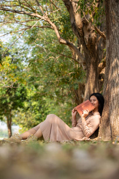 Free Stock Photo of Person Reading Book Under Tree | Download Free ...
