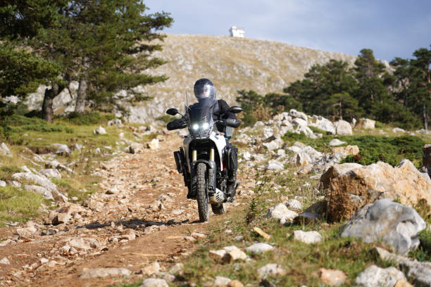 Free Stock Photo of Man Riding Motorcycle Down Dirt Road | Download ...