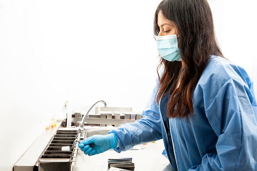 Young Female Scientist Dewaxing Paraffin Embedded Tissue Samples In The ... Young Female Scientist Dewaxing Paraffin Embedded Tissue Samples In The ...