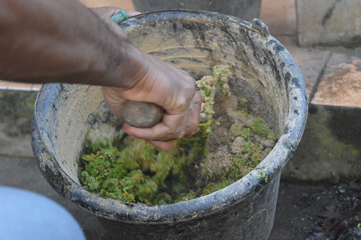Chicken Farmer Is Making And Mixing Chicken Feed Manually Stock Photo ... Chicken Farmer Is Making And Mixing Chicken Feed Manually Stock Photo ...