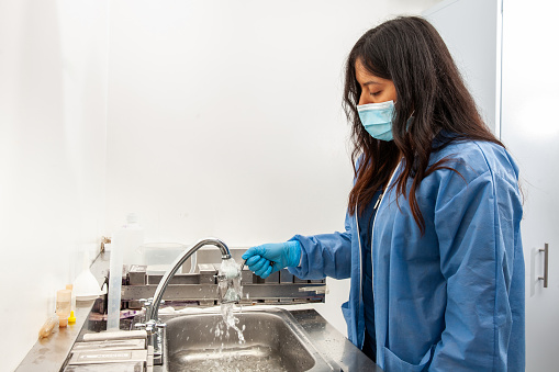 Young Female Scientist Dewaxing Paraffin Embedded Tissue Samples In The ... Young Female Scientist Dewaxing Paraffin Embedded Tissue Samples In The ...
