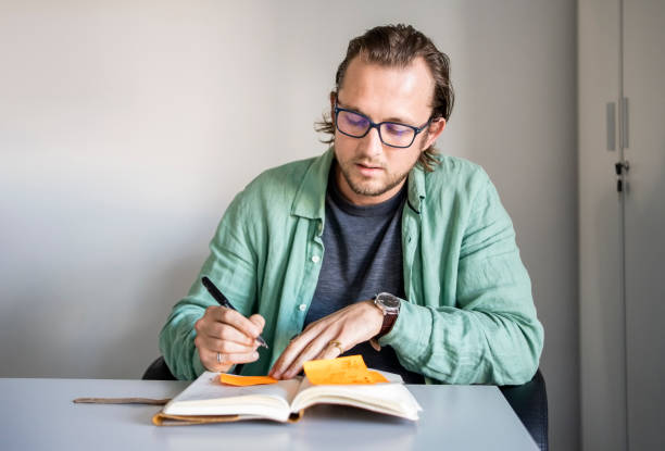 Free Stock Photo of Man taking notes on paper | Download Free Images ...