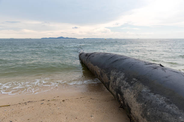 Free Stock Photo of A long pier with a pipe on the beach | Download ...