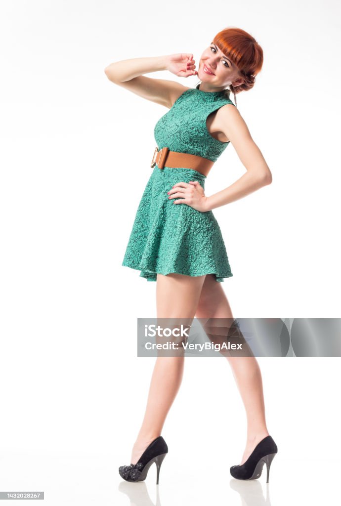Image Of Pretty Redhead Young Lady In Green Dress Standing With Arms