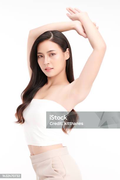 Beautiful Young Asian Woman Lifting Hands Up To Show Off Clean And