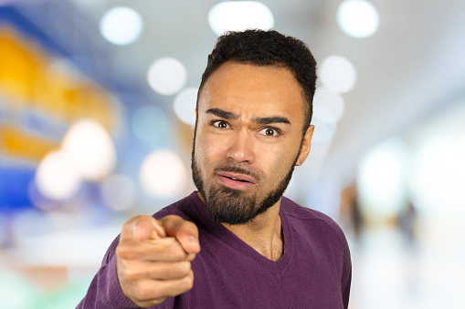 Photo Of Emotional Angry Young African Man Standing Isolated Stock ... Photo Of Emotional Angry Young African Man Standing Isolated Stock ...