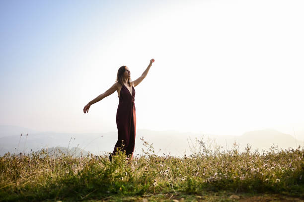 Free Stock Photo of Woman rejoicing in the sunlight in a meadow ...