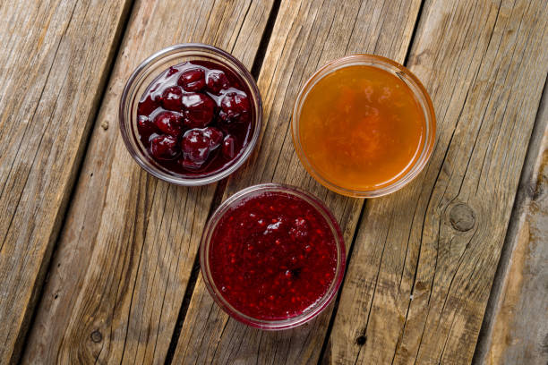 Free Stock Photo of Strawberries and jars of jam on wooden table ...