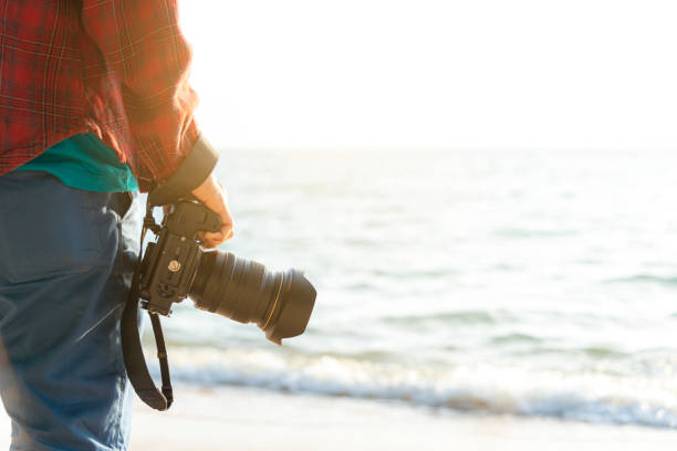 Free Stock Photo of Holding a camera at the beach | Download Free ...