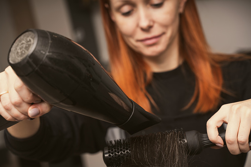 Hairdresser Making Hairstyle Using Hair Dryer Hairstylist Does Cutting ... Hairdresser Making Hairstyle Using Hair Dryer Hairstylist Does Cutting ...