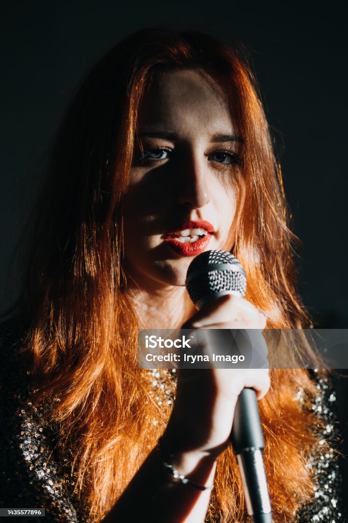 Portrait Of Redhead Female Singer Woman In Sparkly Evening Dress