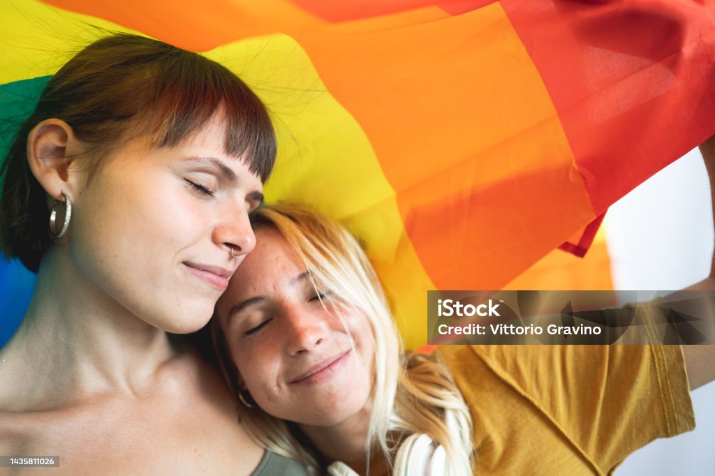 Portrait Of Young Lesbian Couple Hugging Each Other While Standing