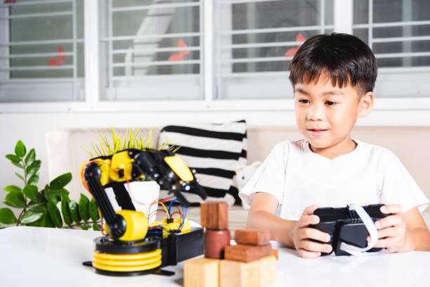 Free Stock Photo of Little Boy Playing With Robot Toy | Download Free ...