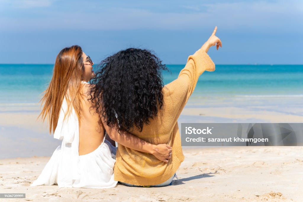 Lgbtq Lesbian Couple On The Beach The Couple Went To The Sea On