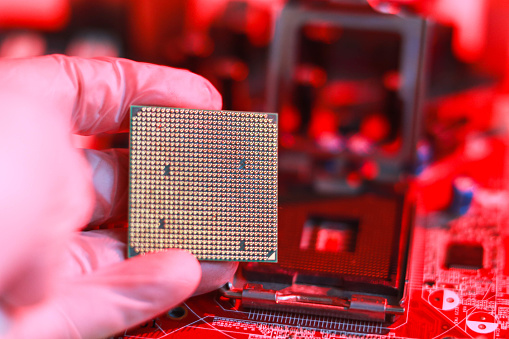 Technician Installing Cpu Chip Microprocessor Socket On Motherboard ... Technician Installing Cpu Chip Microprocessor Socket On Motherboard ...