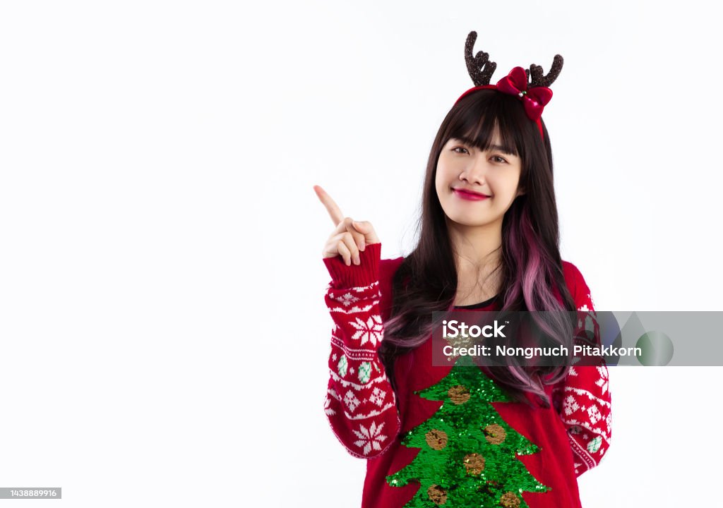 Asian Woman In Red Christmas Sweater Reindeer Horns Headband Finger
